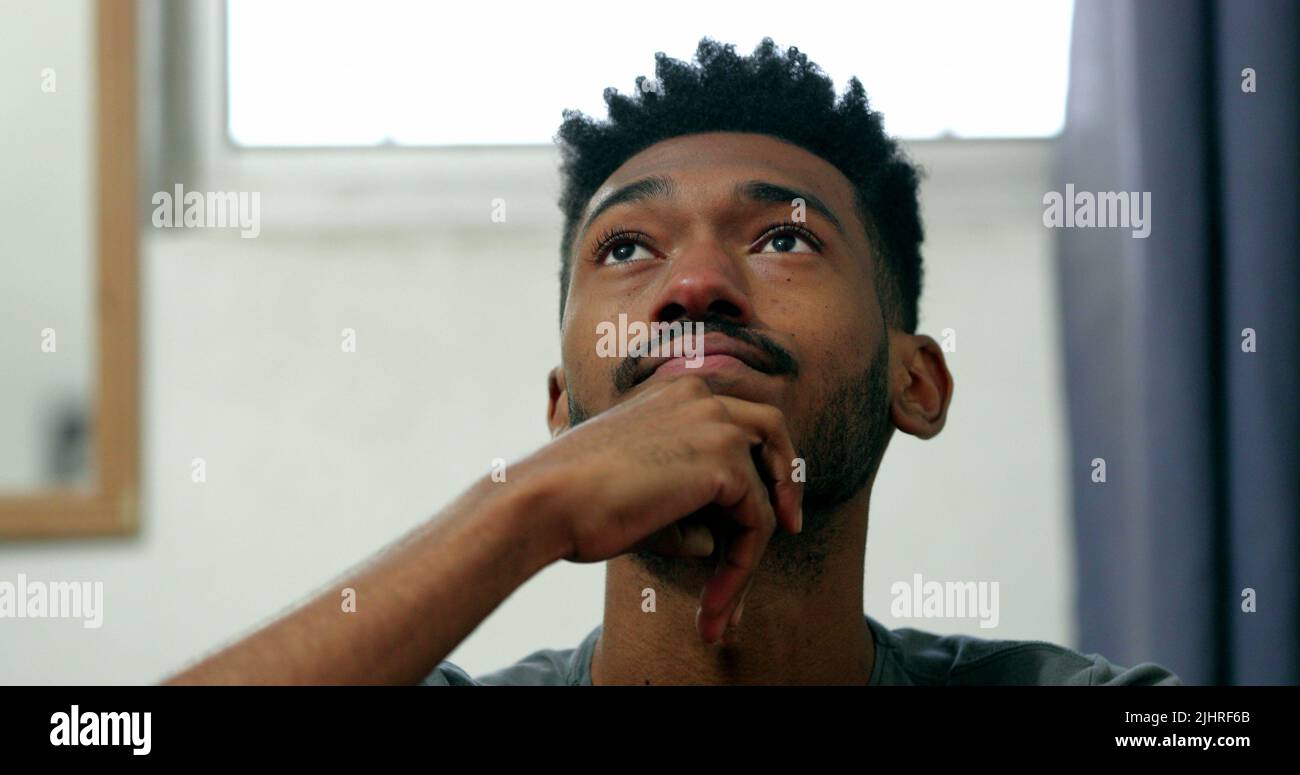 Pensive black man in trouble. African young person in difficult times ...