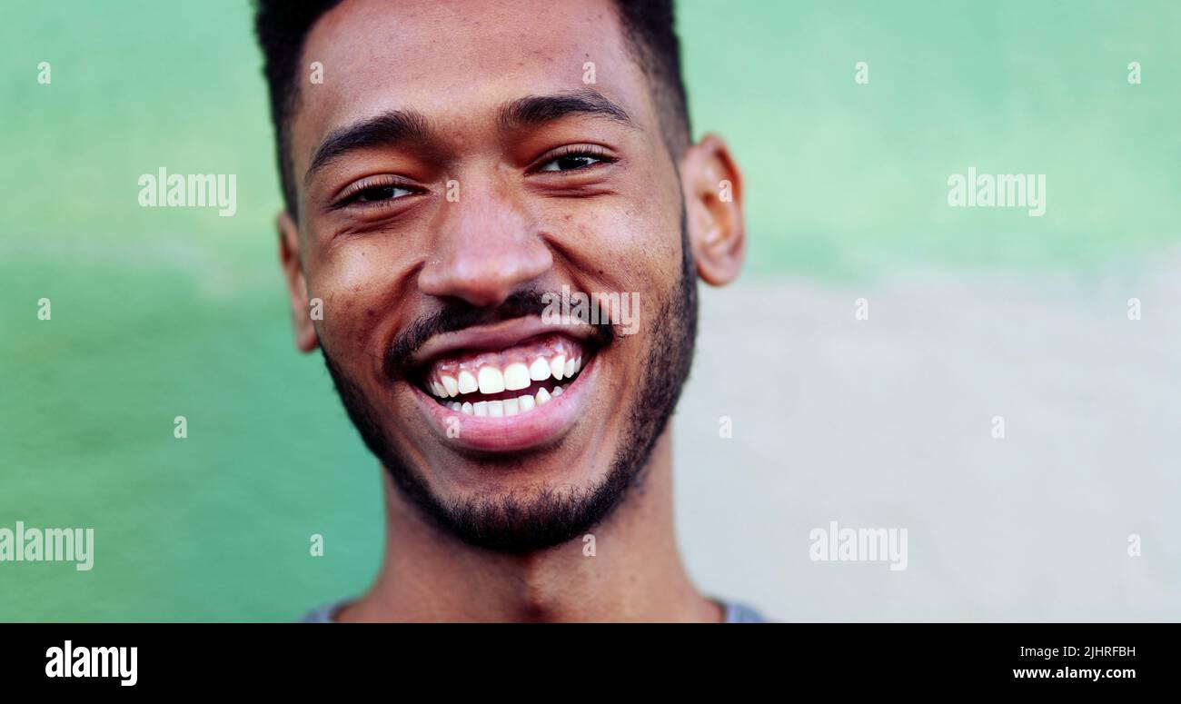 Relaxed black mixed race man outside close-up face Stock Photo - Alamy