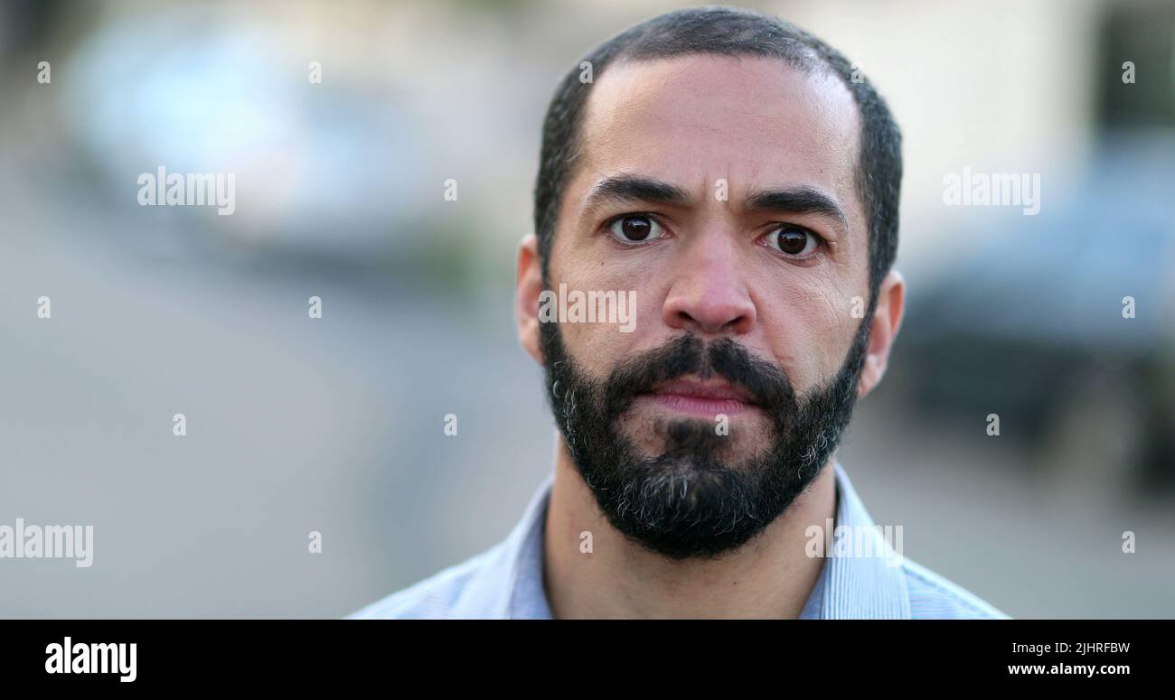 Serious hispanic portrait man close-up face. 40 year old person, real ...
