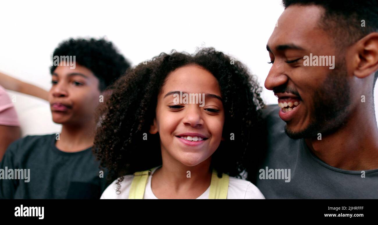 Siblings love care and affection. Older brother kissing little sister ...