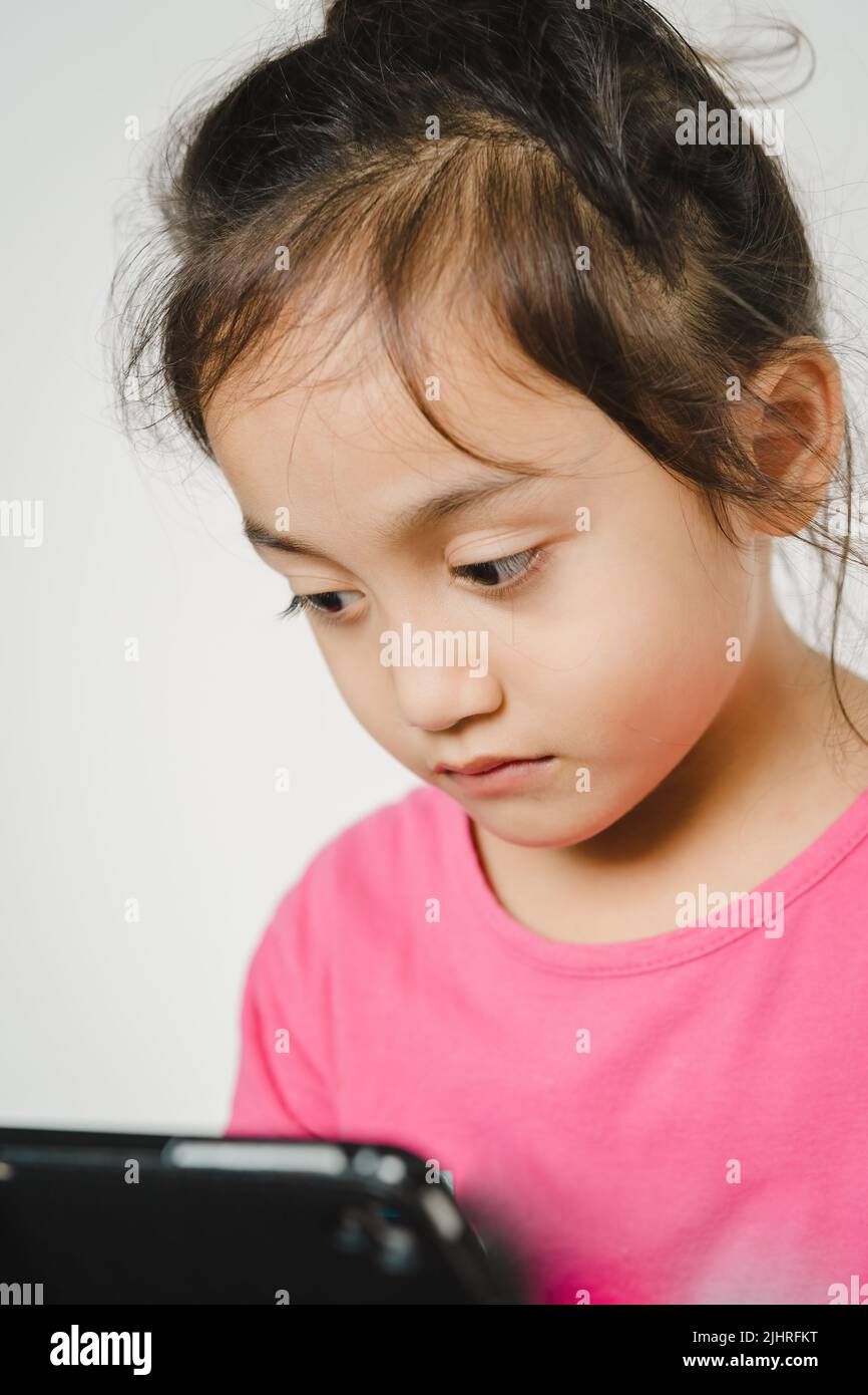 Child sad using computer home hi-res stock photography and images - Alamy