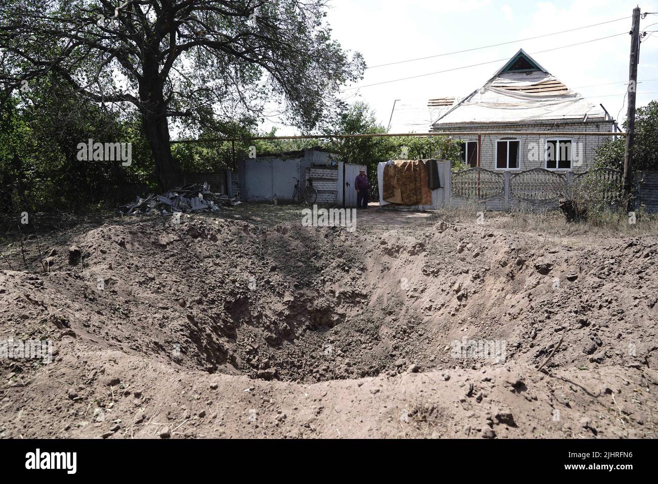 Kostiantynivka, Ukraine - July 9, 2022 - The crater from a Russian ...