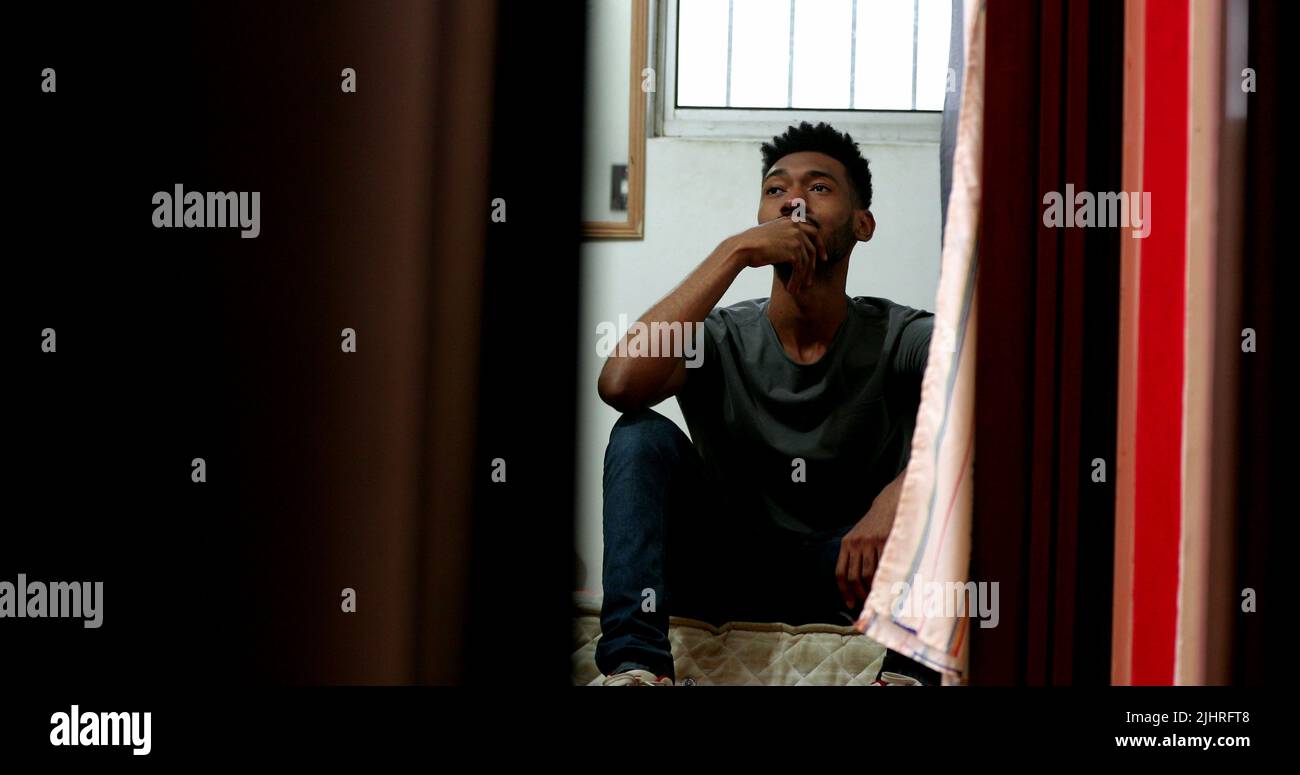Troubled Black man feeling unhappy and lonely. Desperate frustrated ...