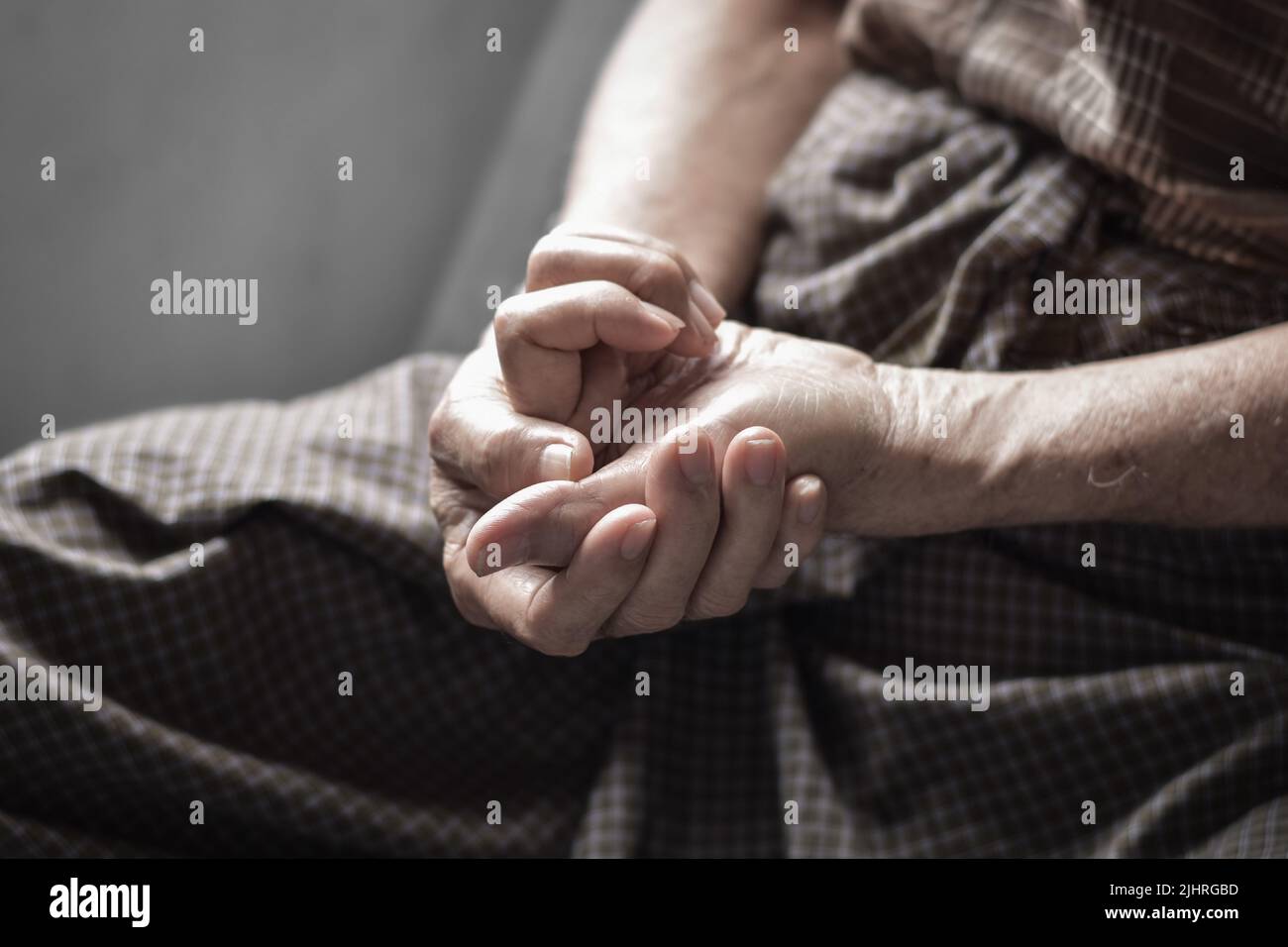 Inflammation of Asian old man thumb. Concept of painful digit ...