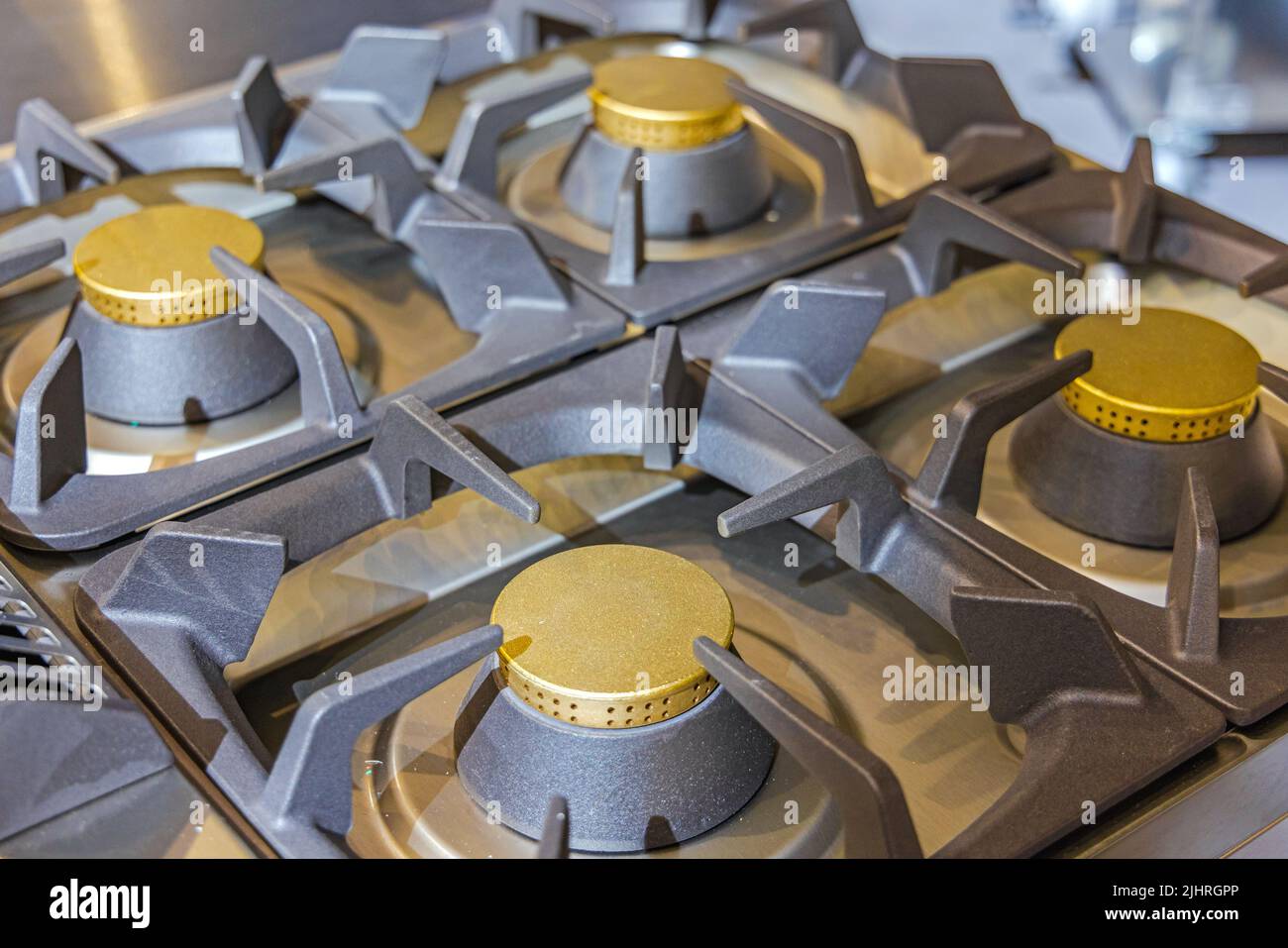 Gas Burning Stove Top With Four Brass Burners Hubs Stock Photo - Alamy