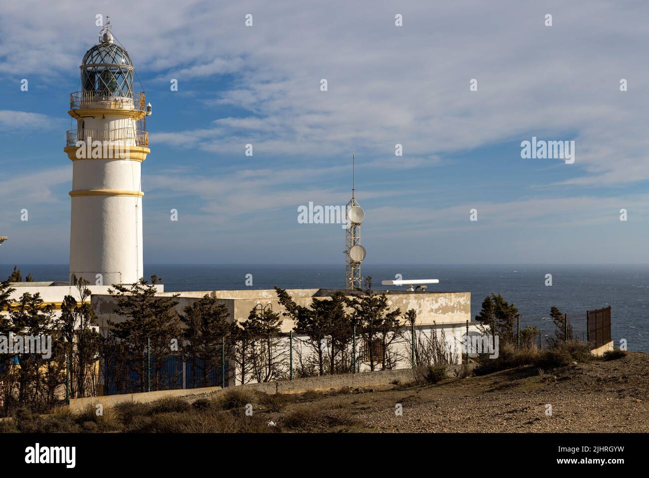 The Cabo Sacratif lighthouse on the coast of Andalusia near Motril in ...