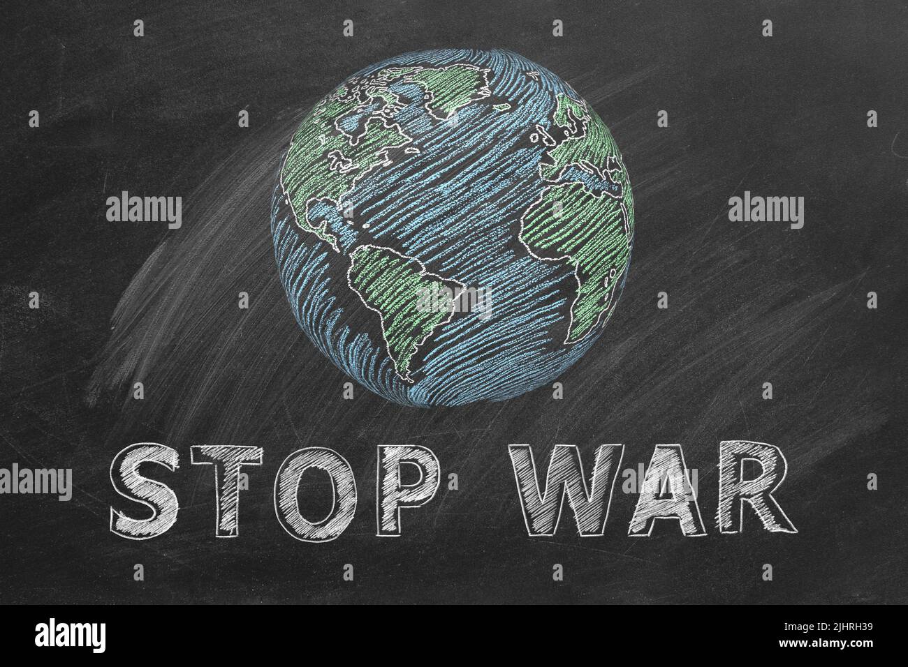 Globe with lettering STOP WAR. Chalk drawn illustration on blackboard ...
