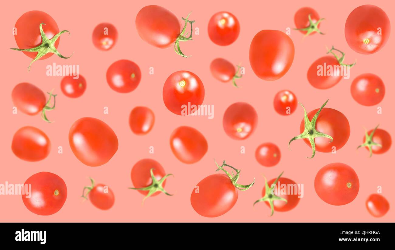 Falling tomato isolated on white background Stock Photo - Alamy