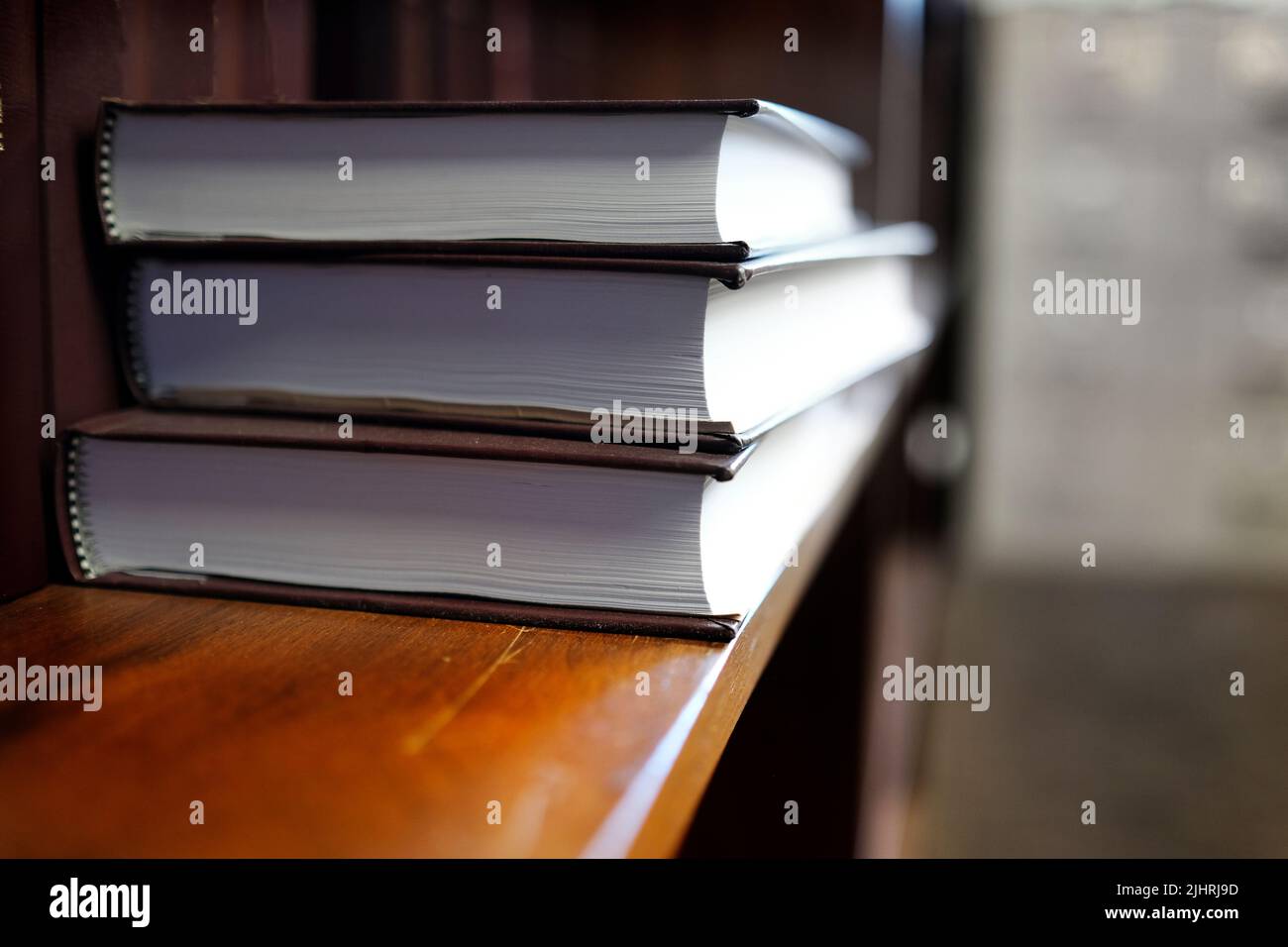 Books on shelves in a library old bookshelves for reading and study ...