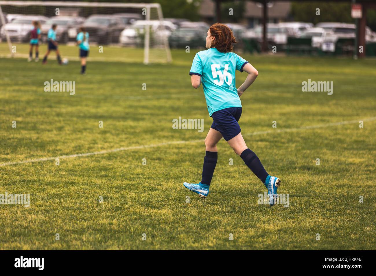 Girl in blue soccer uniform hi-res stock photography and images - Alamy