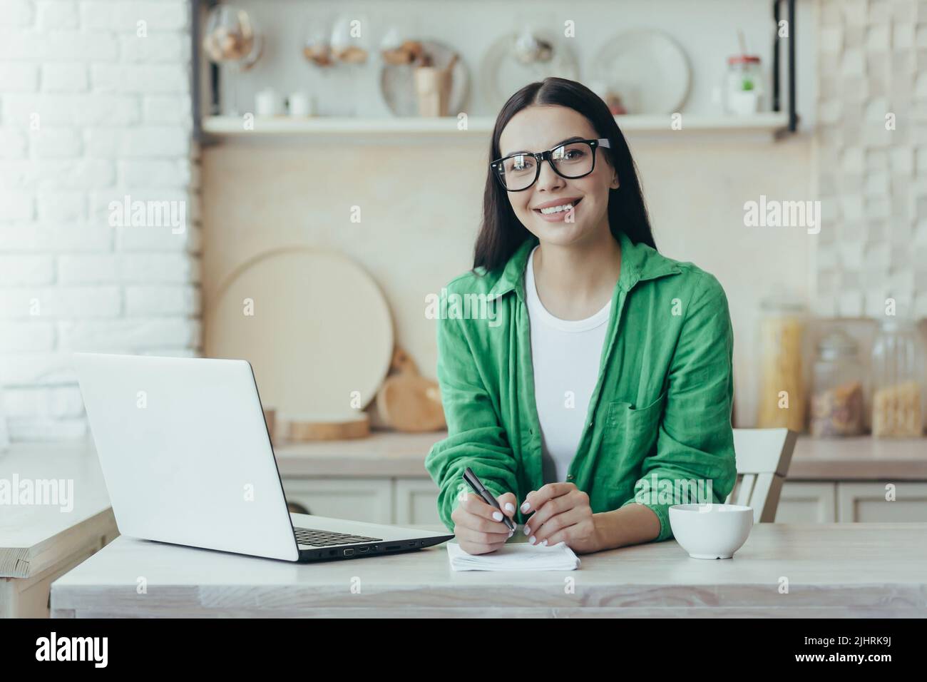 Successful young woman sitting laptop hi-res stock photography and ...