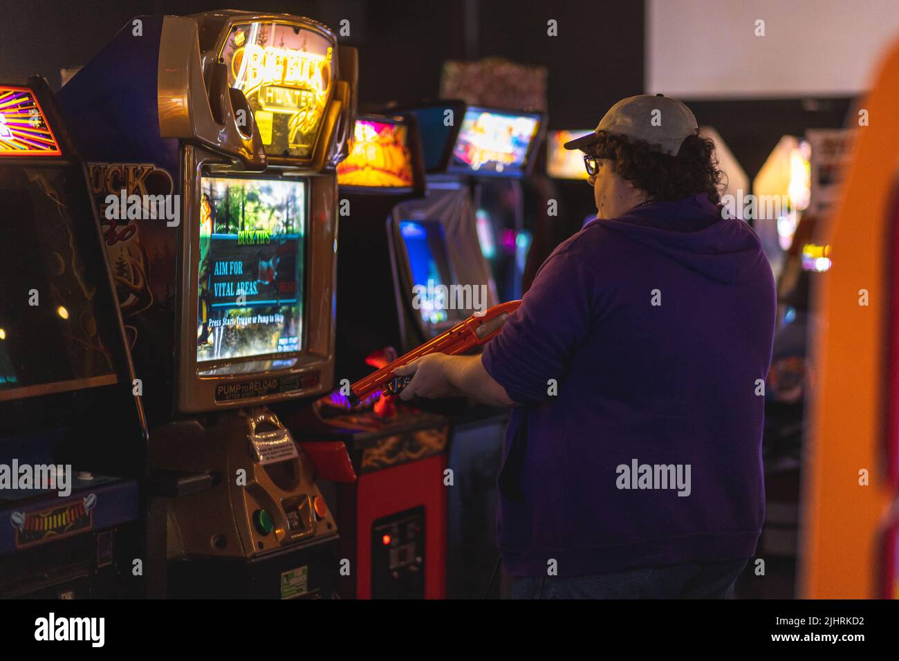 A man enjoying the arcade game offered by Fort Worth's local arcade bar ...