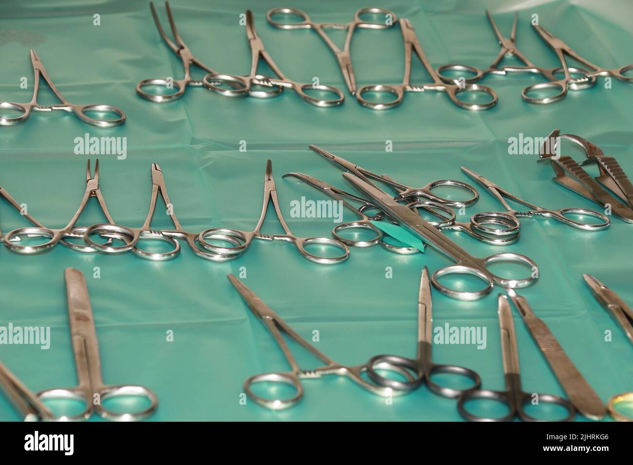 A closeup shot sterile tray with surgical instruments arranged for a ...