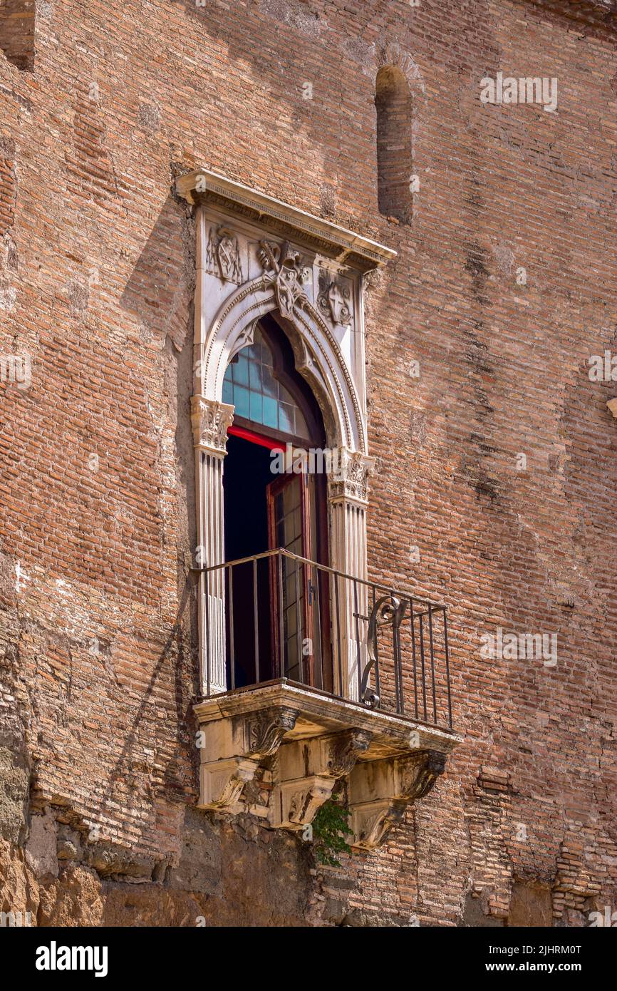The old brick building with a balcony in Rome, Italy Stock Photo - Alamy