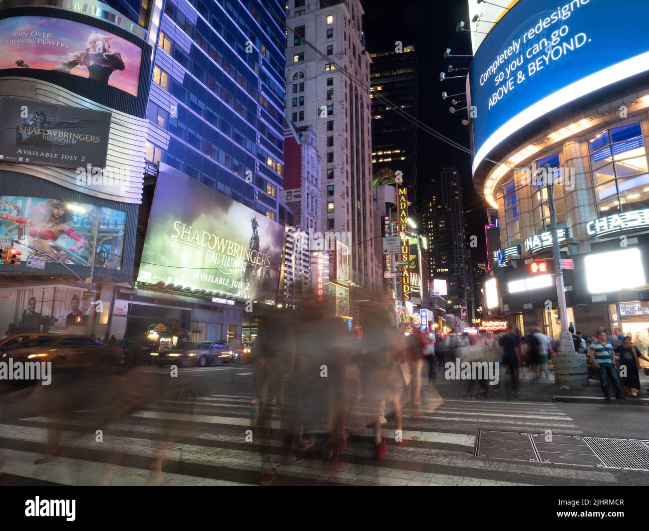 Long exposure image of a pedestrian crossing near Times Square Stock ...