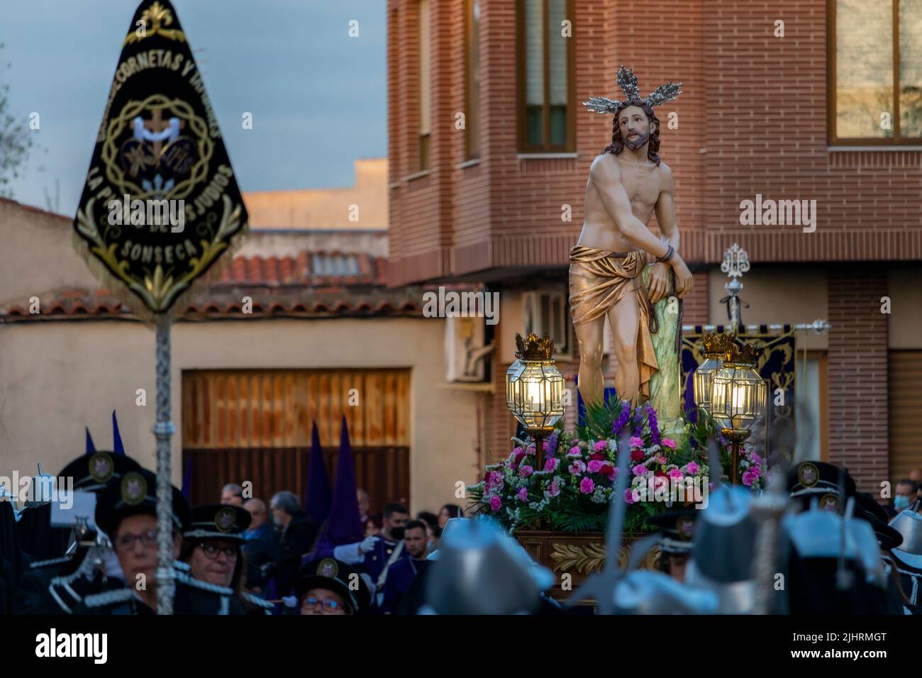 A closeup of procession of Jesus Christ tied to the column Stock Photo ...