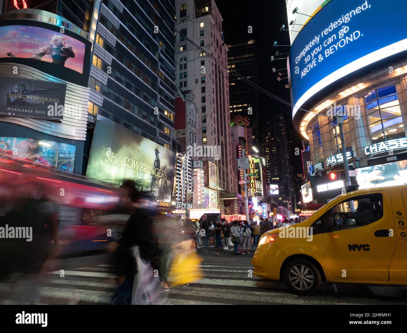 Long exposure image of a pedestrian crossing near Times Square Stock ...