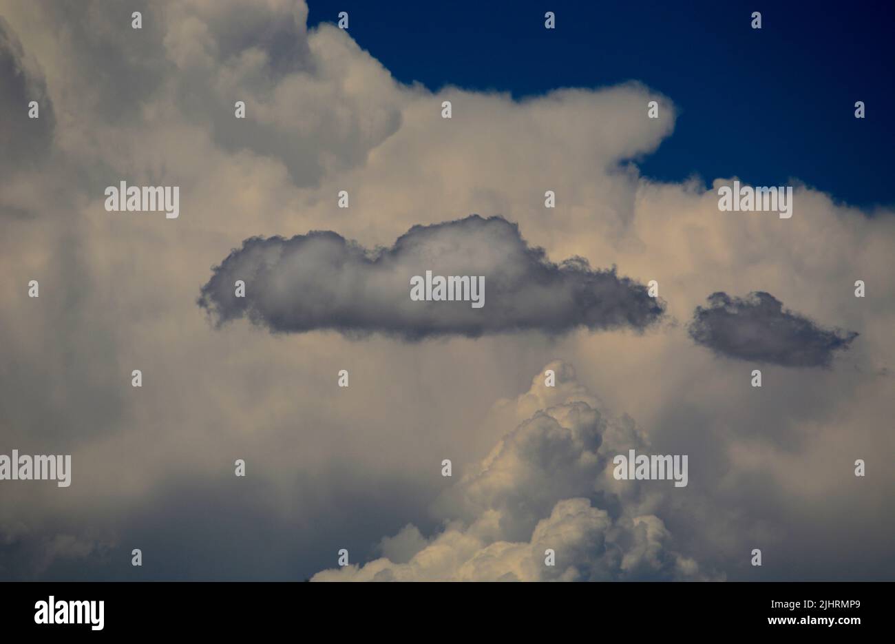 Cumulus clouds fill the sky over Santa Fe, New Mexico Stock Photo - Alamy