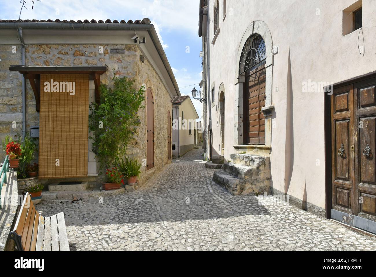 A neighborhood with narrow street between old houses in Fontana Liri ...