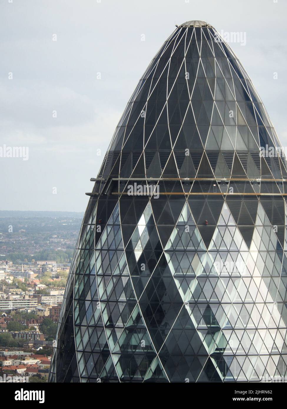 A vertical shot of the Gherkin Skyscraper in London, United Kingdom ...