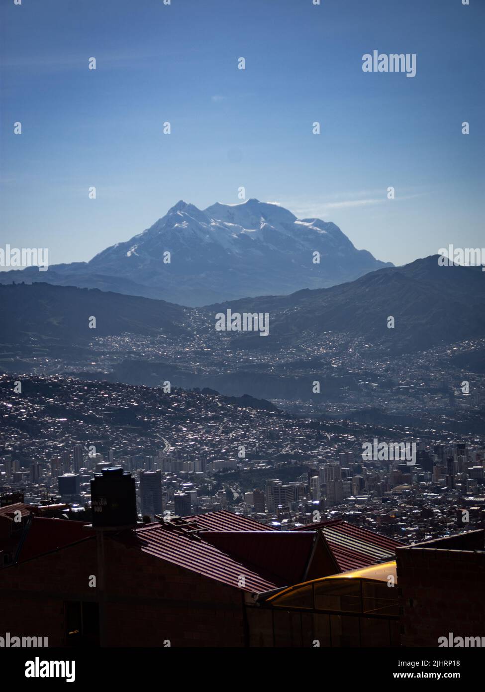The La Paz with its modern urban skyline and skyscrapers and Andes ...