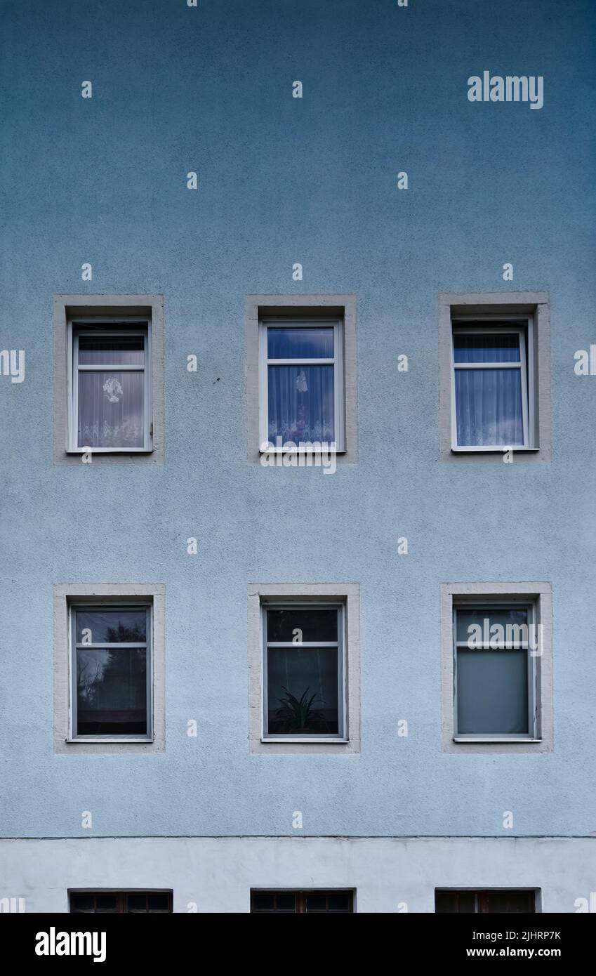 Minimalist house facade with windows and a blue color gradient Stock ...