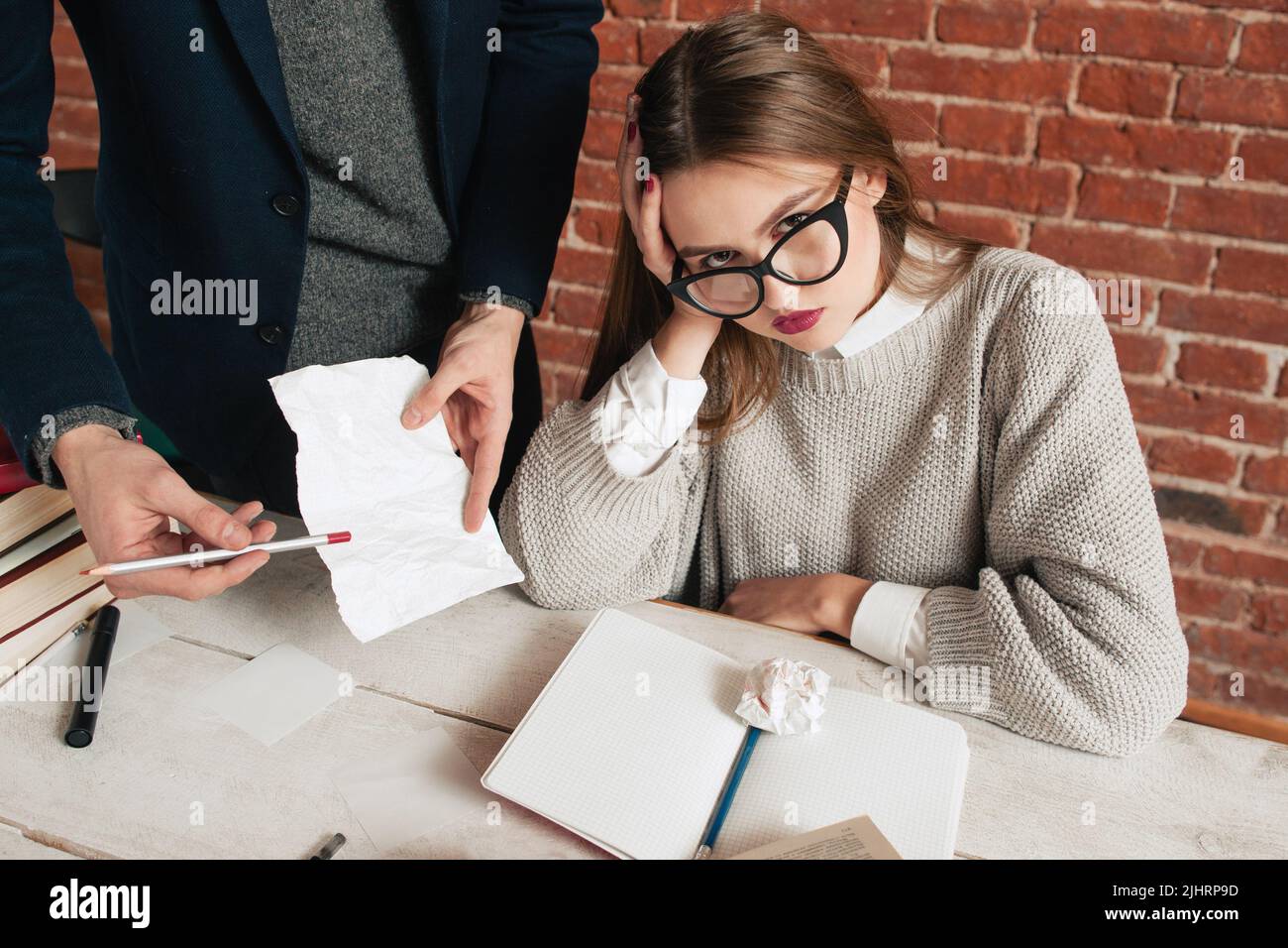 Boring student girl looking at camera Stock Photo - Alamy