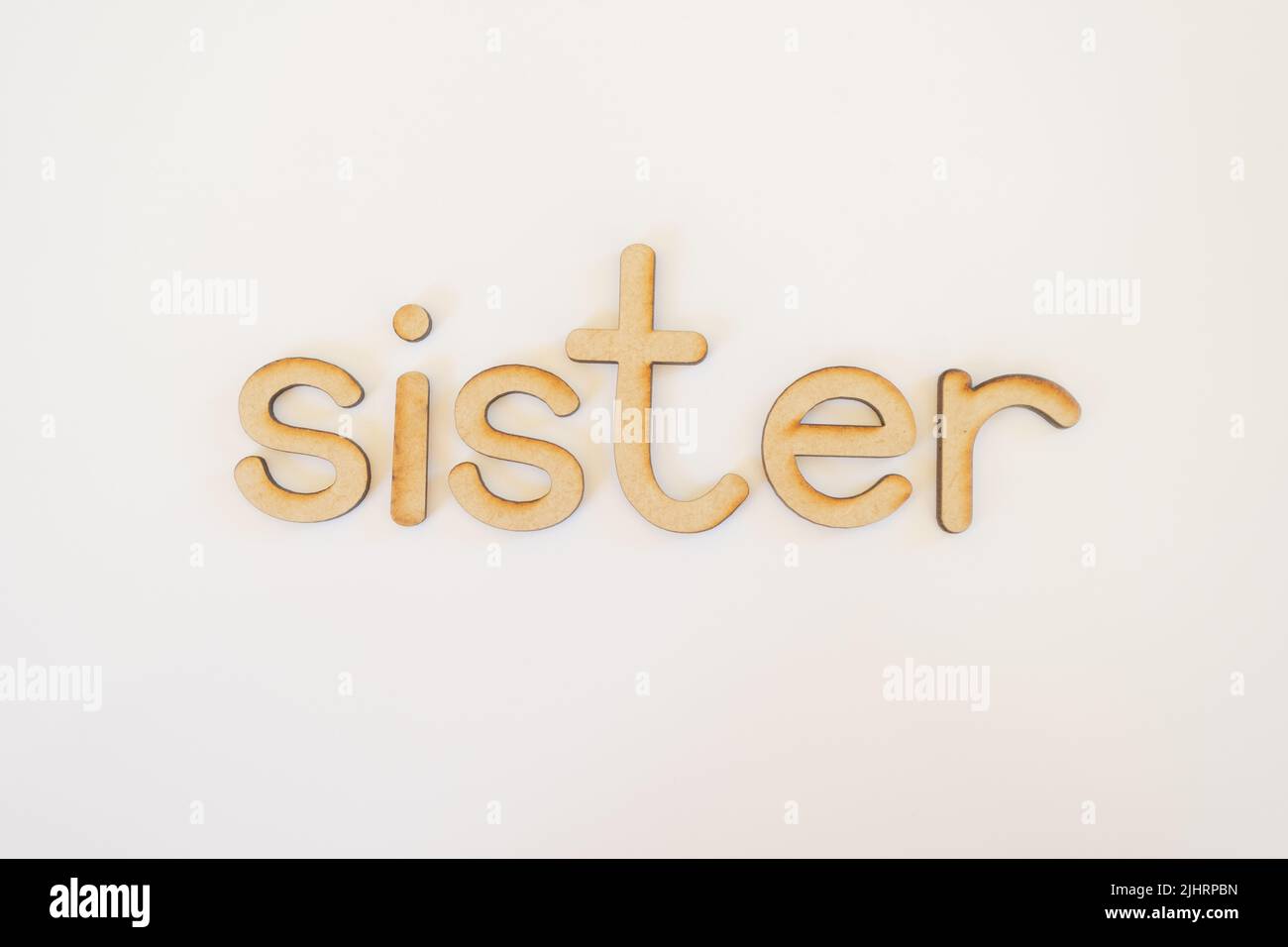 A word Sister made with wooden letters Stock Photo - Alamy
