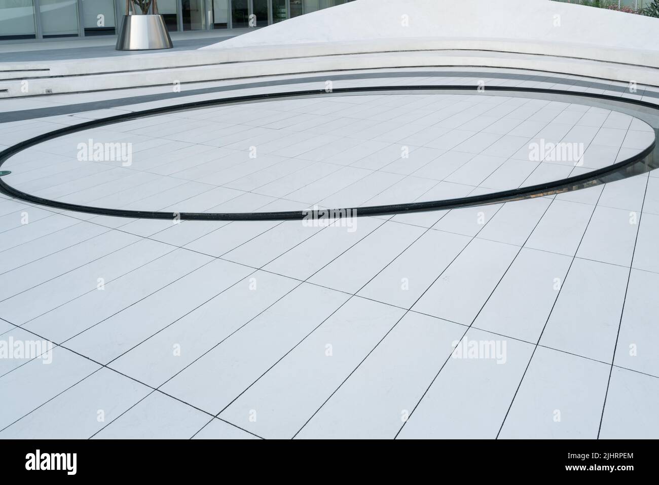 A top view of white empty ground floor in front of modern office ...