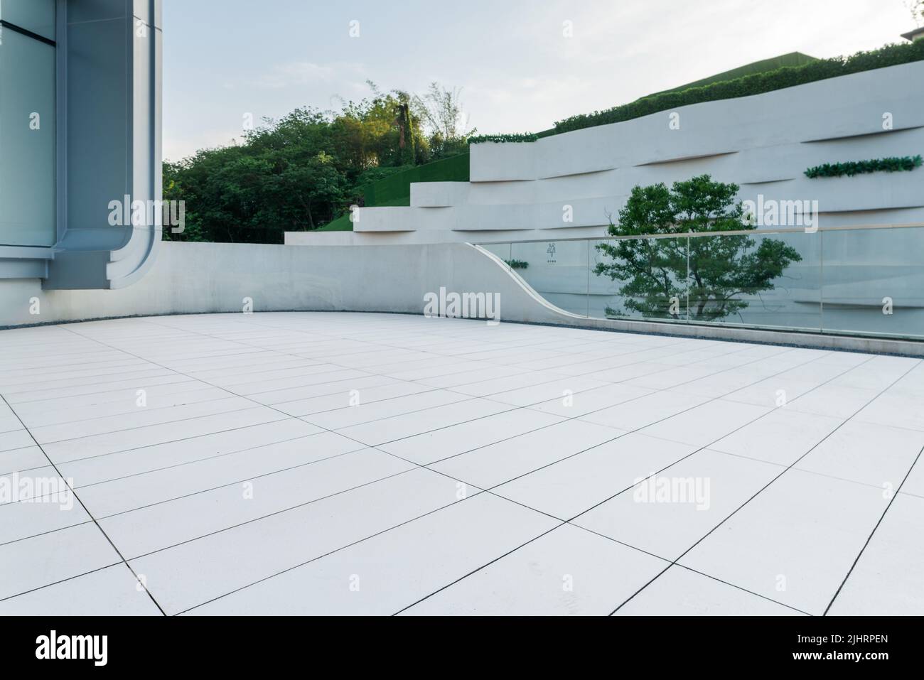 A top view of white empty ground floor in front of modern office ...