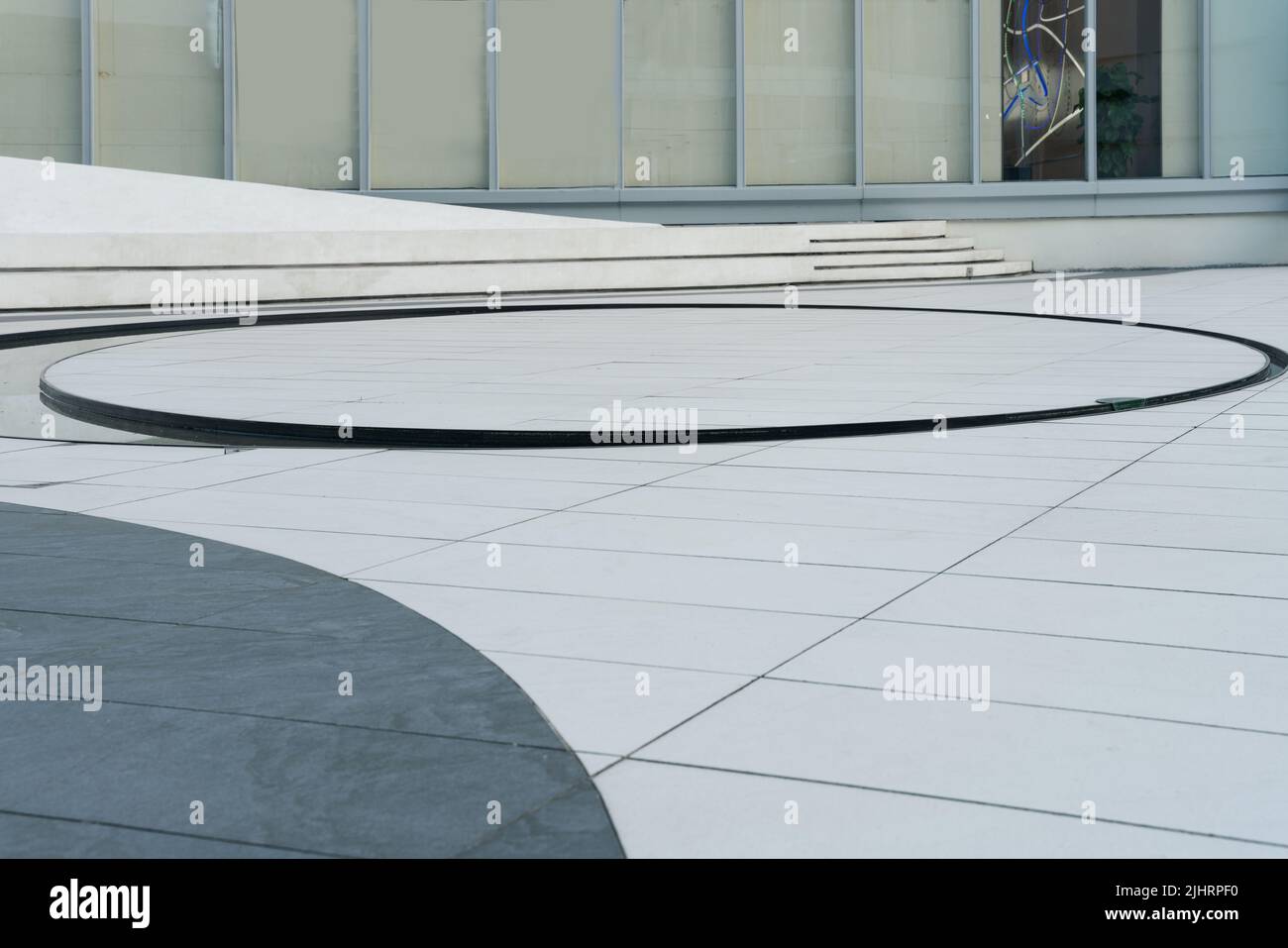 A top view of white empty ground floor in front of modern office ...