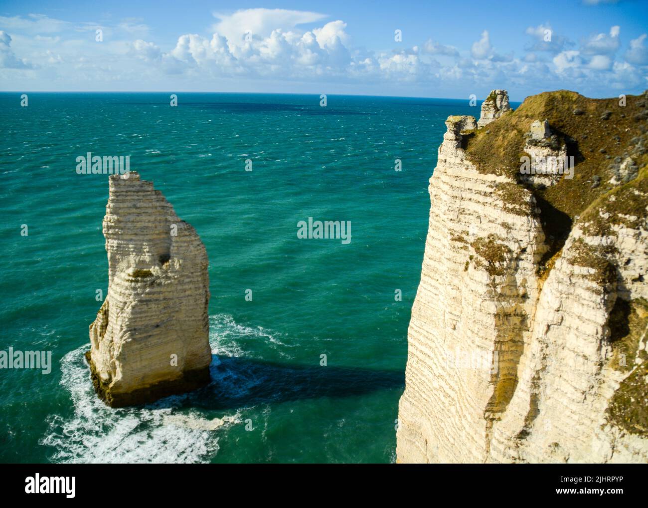 A scenic aerial view of cliffs at the sea in daylight Stock Photo - Alamy