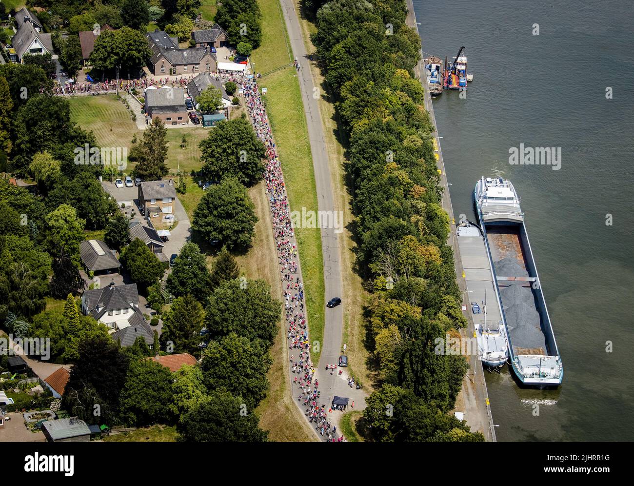 2022-07-20 13:57:11 NIJMEGEN - Hikers seen from the air walk over the ...