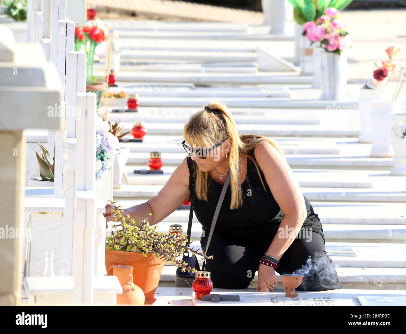Nicosia, Cyprus. 20th July, 2022. A woman mourns for a relative during ...