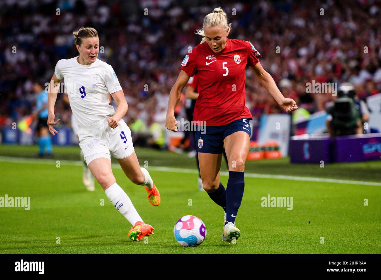 BRIGHTON, ENGLAND - JULY 11: Guro Bergsvand of Norway (R) is chased by Ellen White of England (L ...