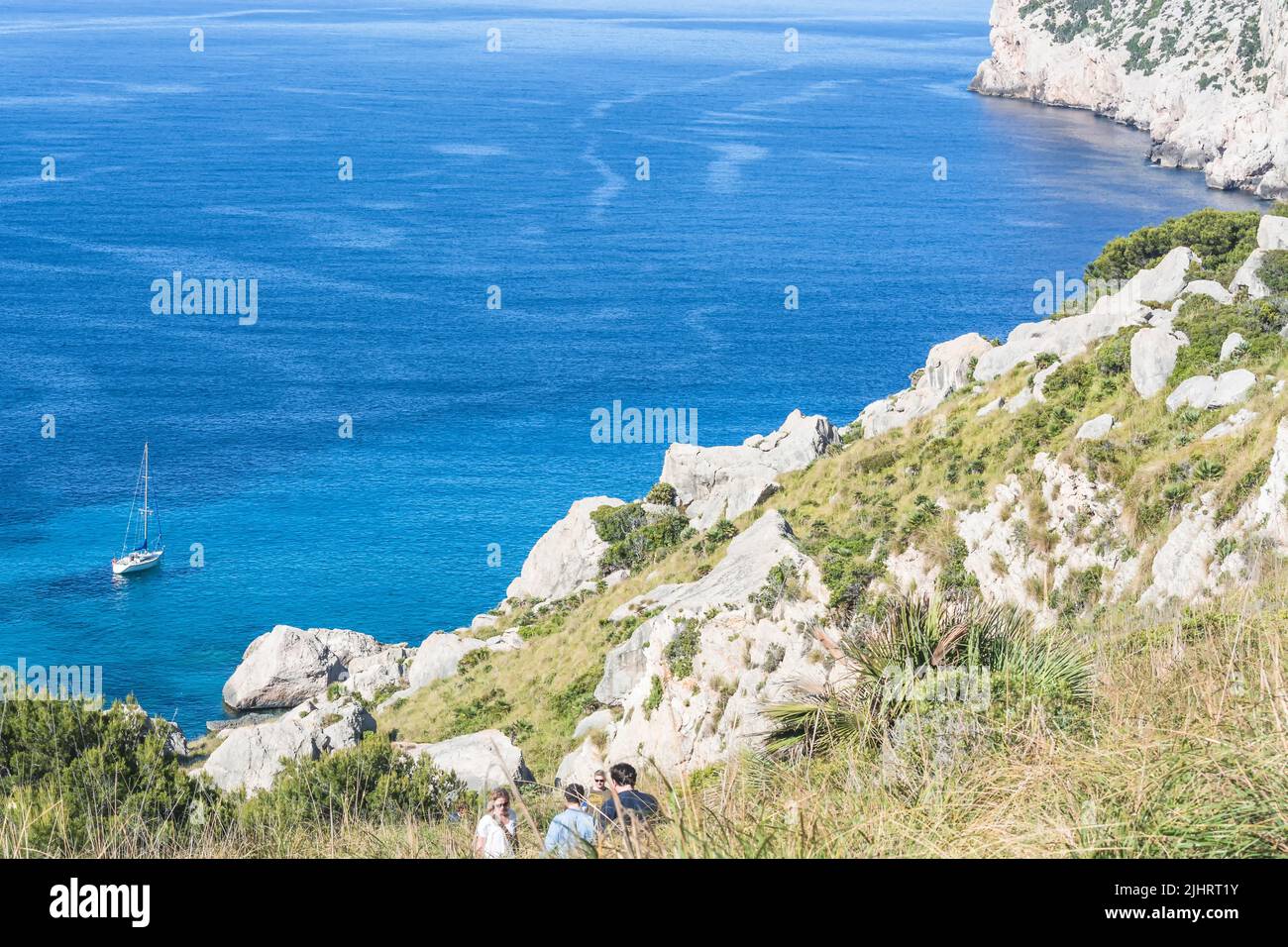 Lonely bay with sailing ship on the island of Majorca, Spain Stock ...
