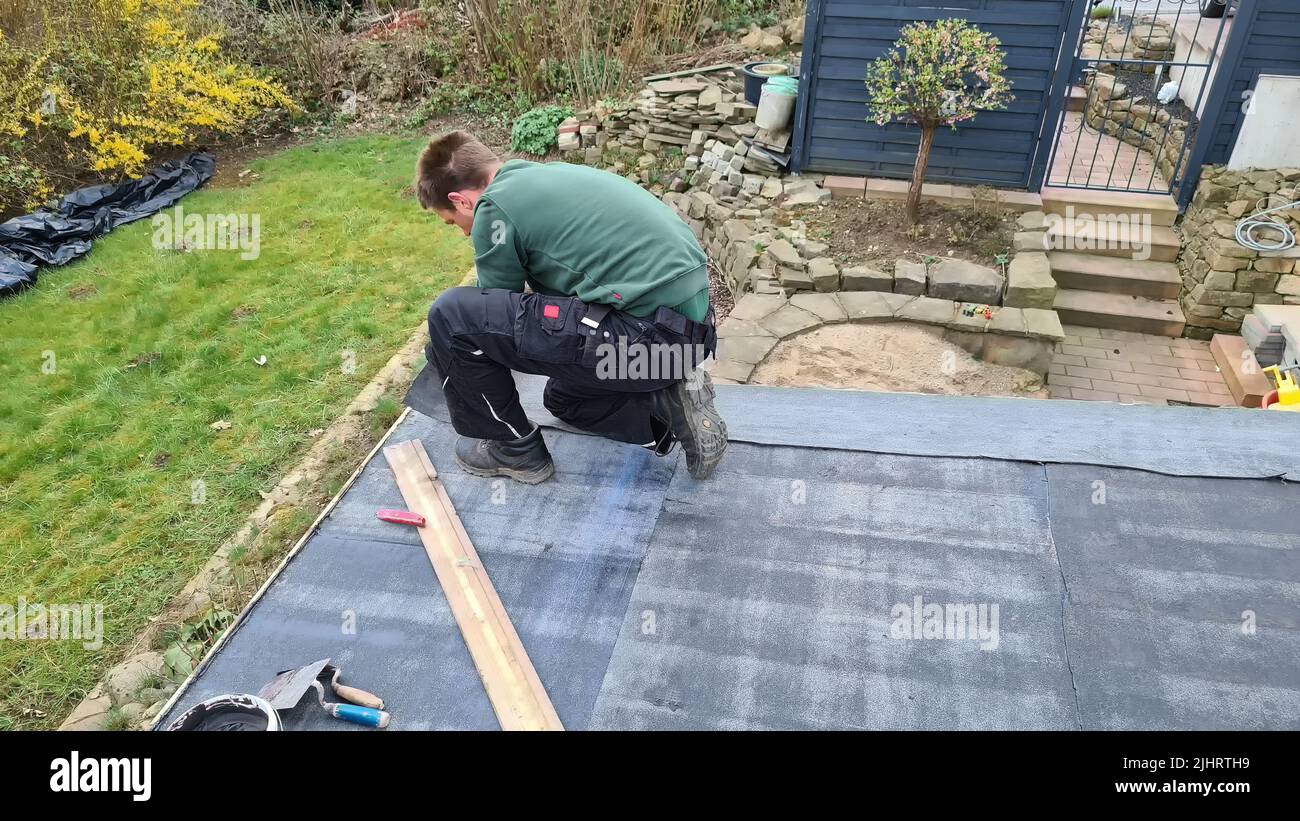 Roofing felt welding on bitumen roof roof repair with roofing felt and ...