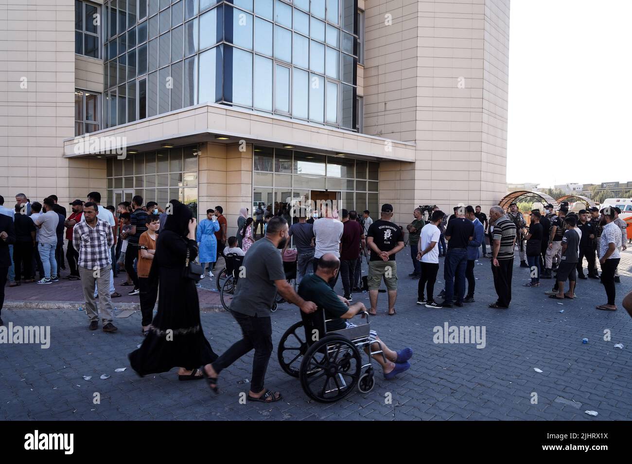 Zakho, Iraq. 20th July, 2022. People crowd outside a hospital in Zakho ...