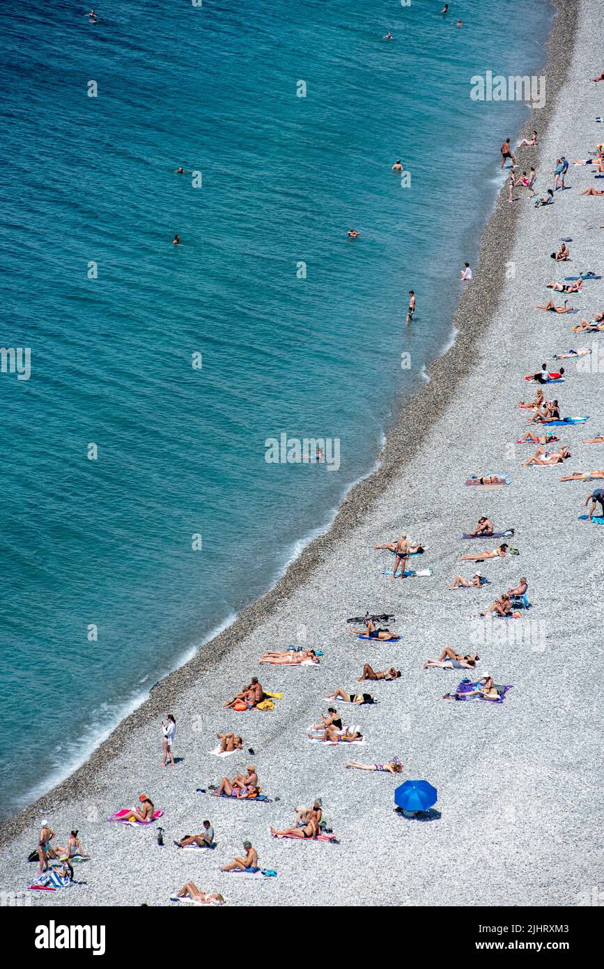 An aerial view of people tanning on a beach Stock Photo - Alamy