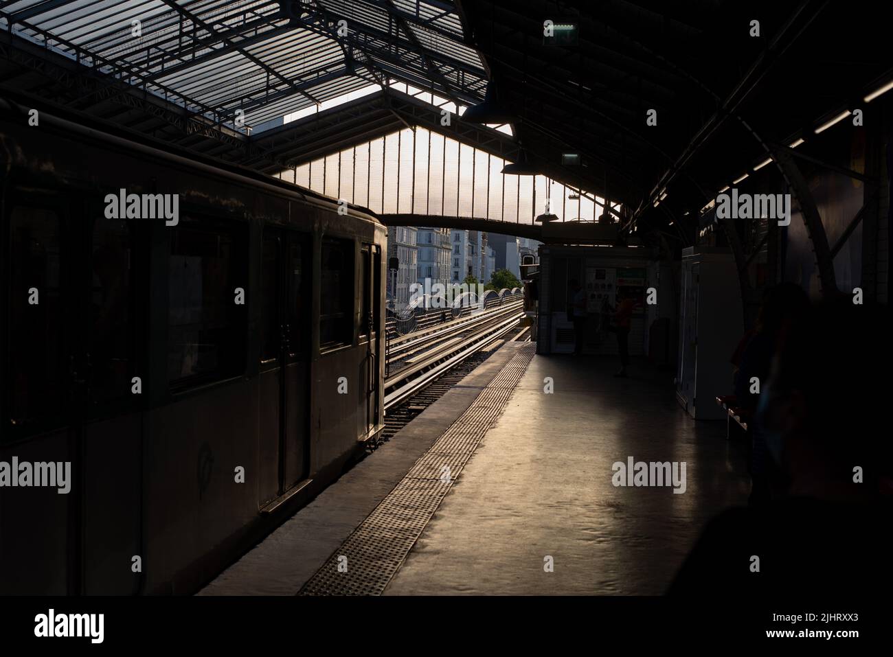 A train arriving to station Stock Photo - Alamy