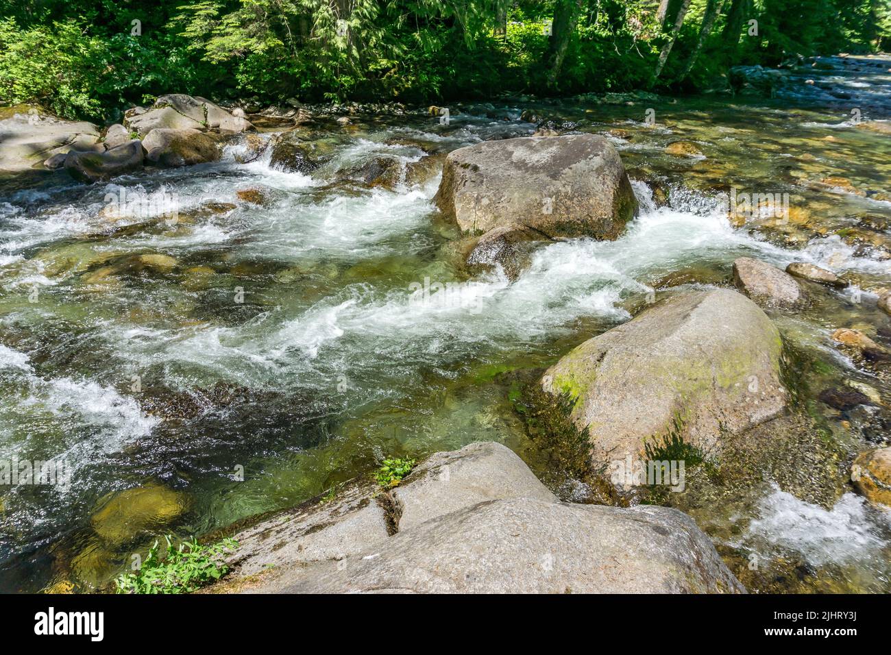 Rushing water rapids at Denny Creek in Washington State Stock Photo - Alamy