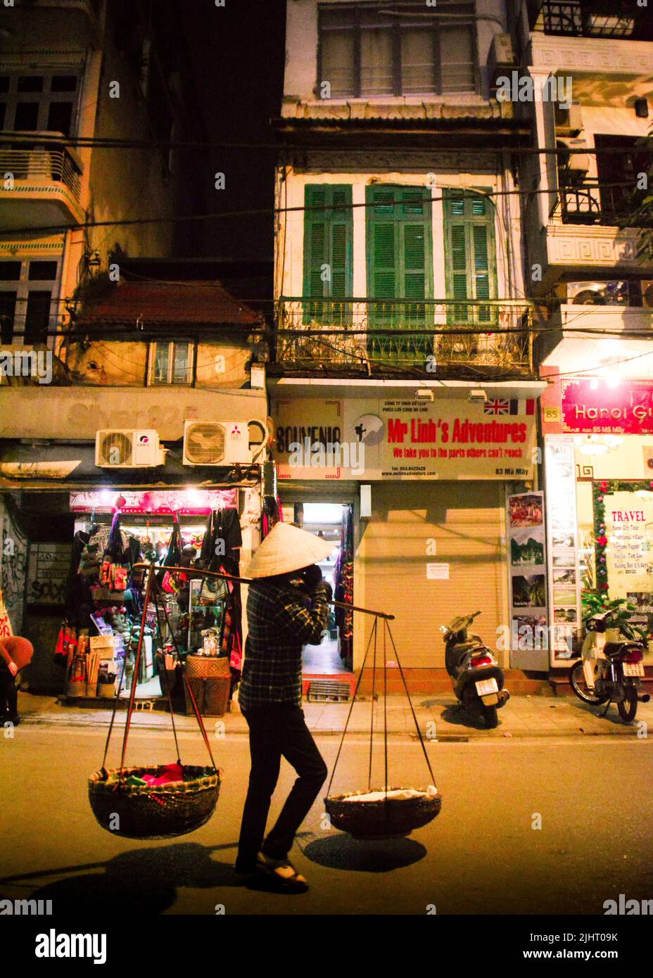 A local typical man walking in Vietnam, Hanoi Stock Photo - Alamy