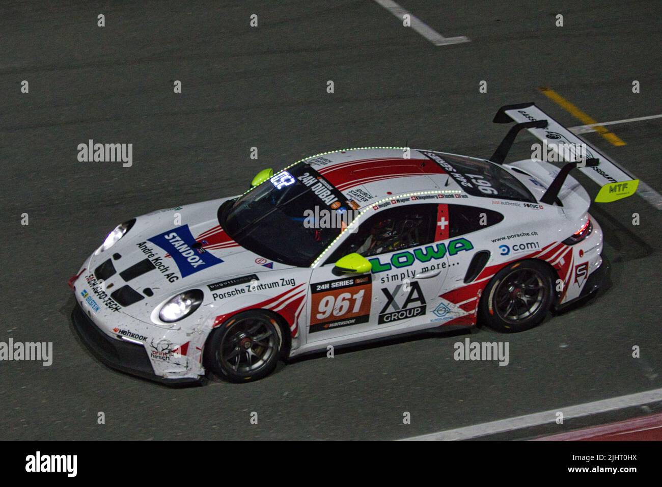 A sports car racing during the 24H Series Hankook at the Dubai ...