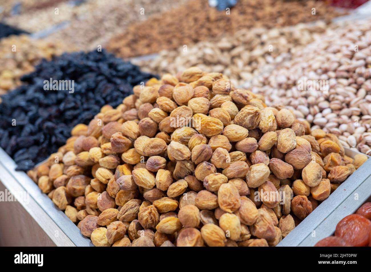 Dried fruits and nuts on local food market Stock Photo - Alamy