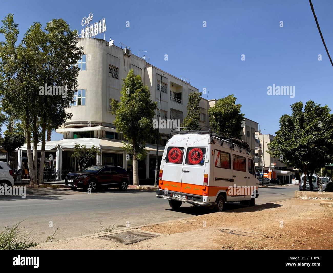 A Mercedes 207 van parked on the roadside in Morocco Stock Photo - Alamy
