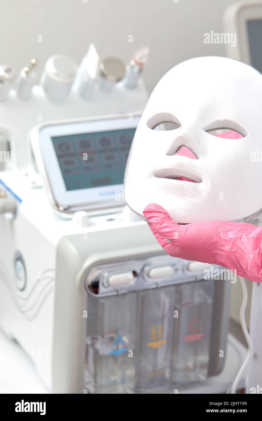 photon mask. Health and beauty. Cosmetic procedure for woman face ...