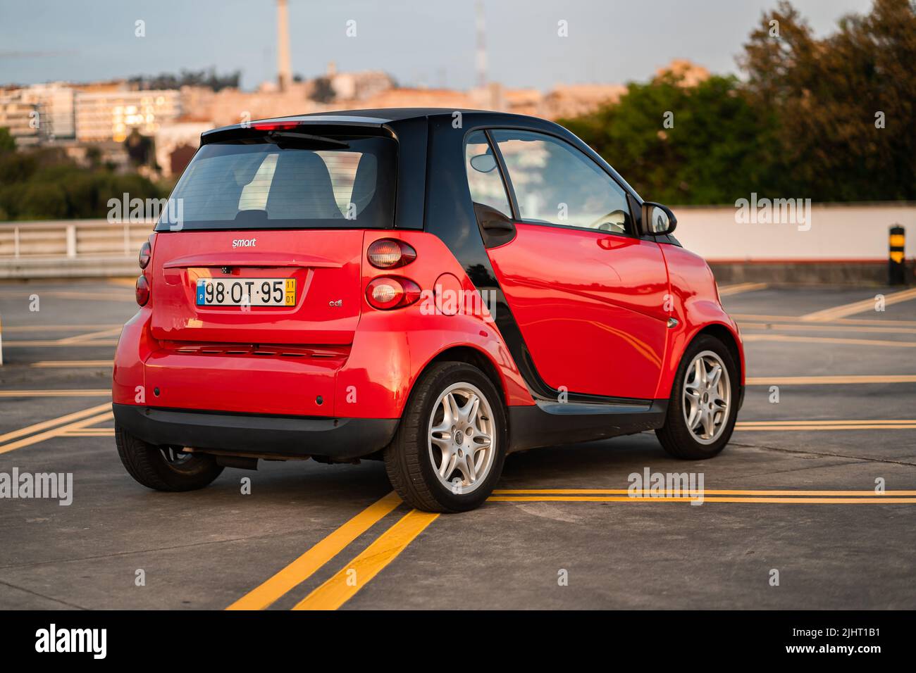 A red smart fortwo car in the parking Stock Photo - Alamy
