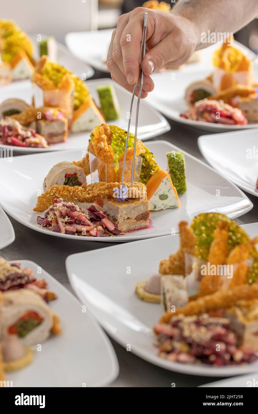Preparing appetizers hi-res stock photography and images - Alamy