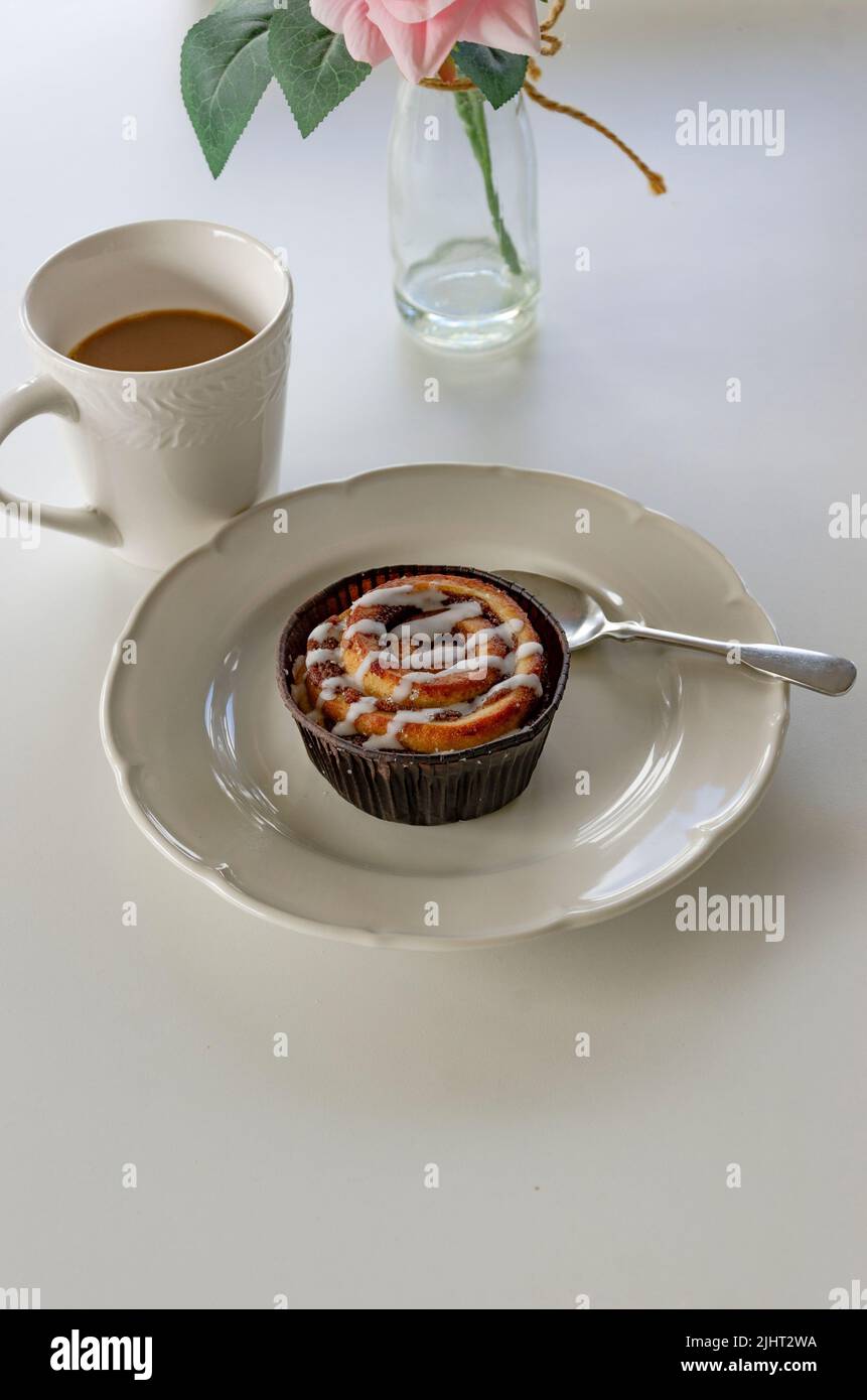 Danish breakfast pastry with a cup of coffee Stock Photo - Alamy