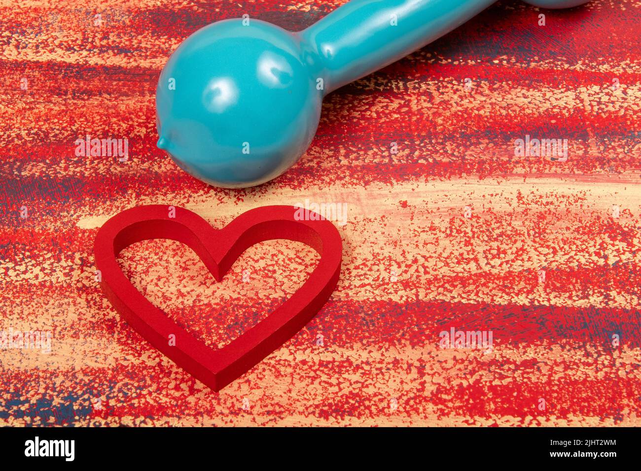 Heart shape and weight for physical activity to symbolize ...